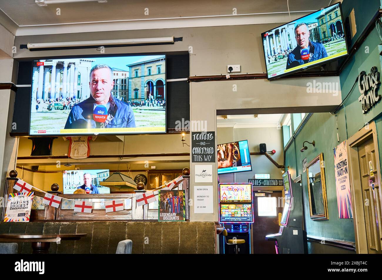 Pub containng multi screen televisions for watching sport Stock Photo ...