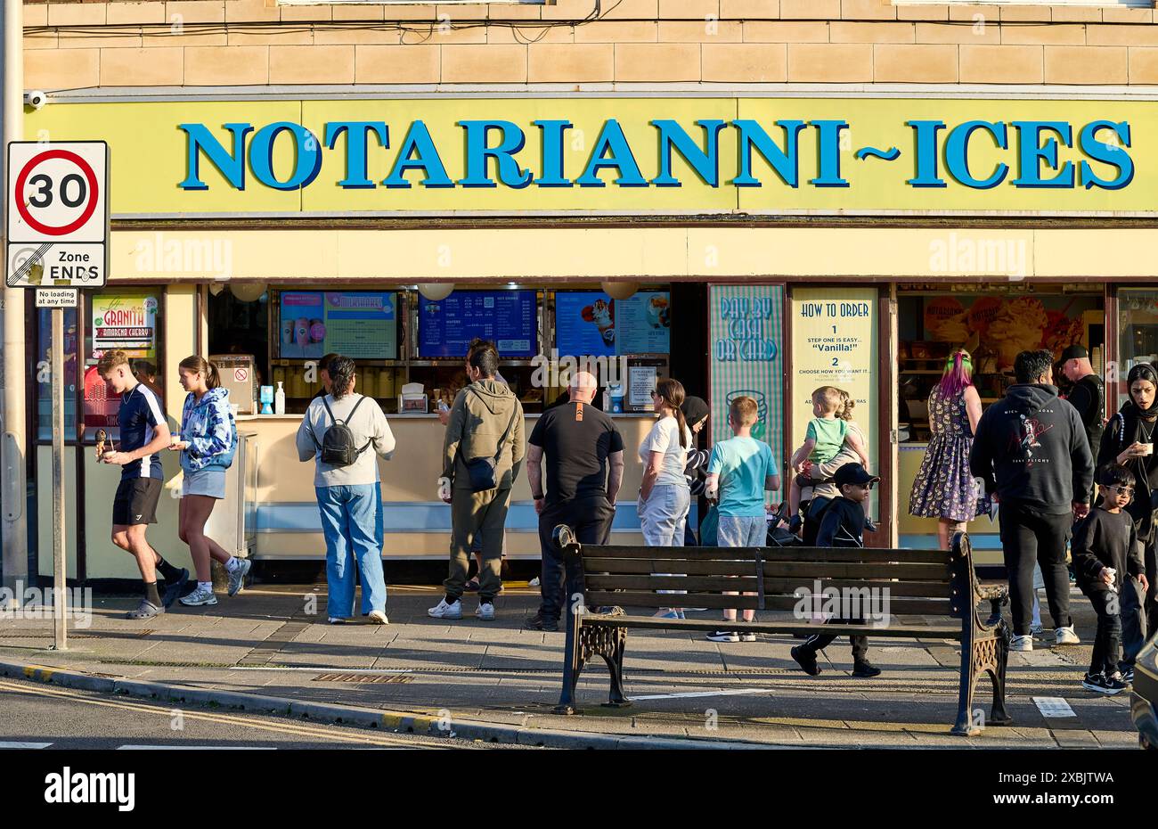 Queing for ice creams at Notarianni's ice cream parlour in Blackpool ...