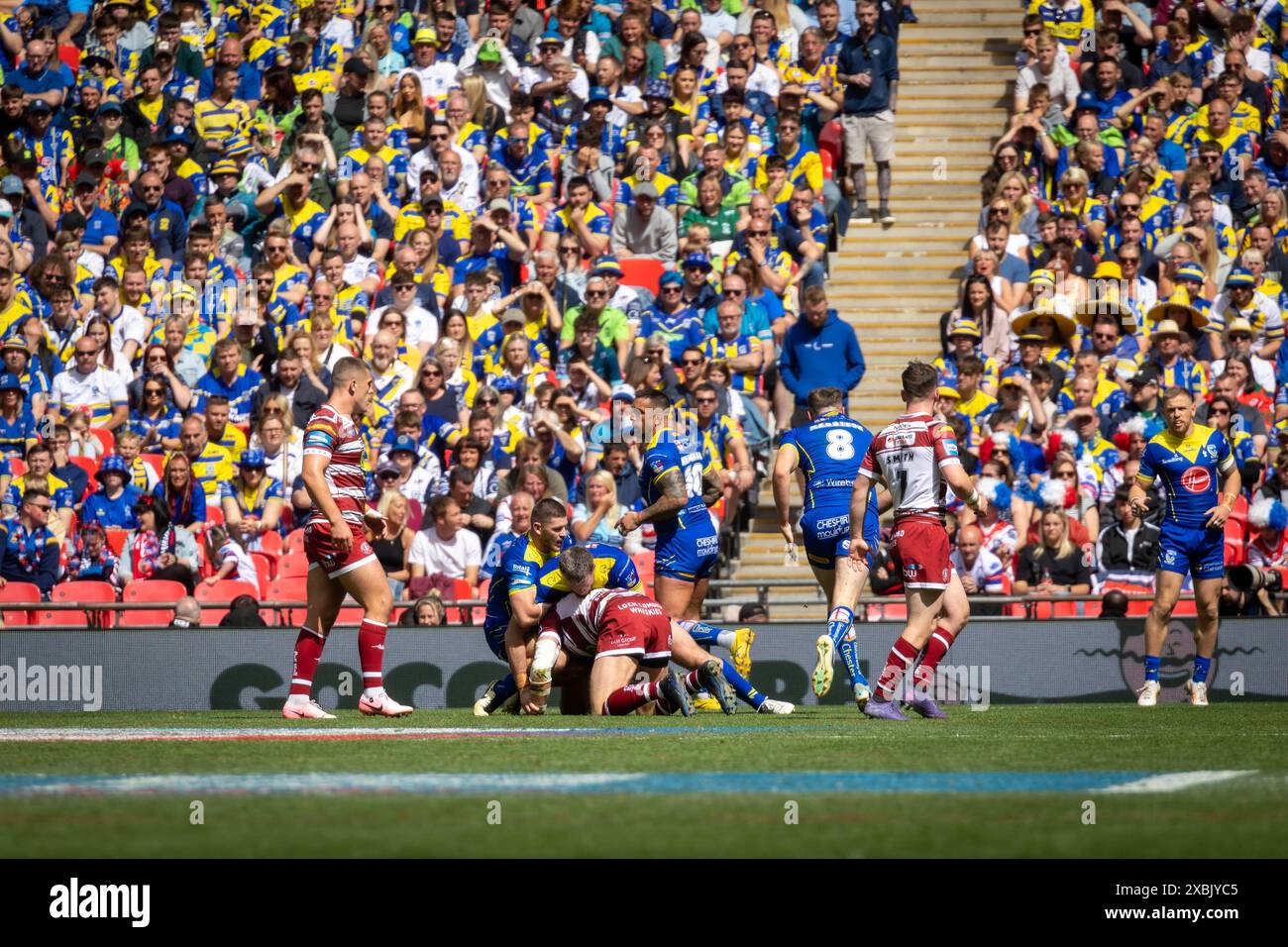 The 2024 Betfred Challenge Cup Final. Luke Thompson is tackled by Danny ...