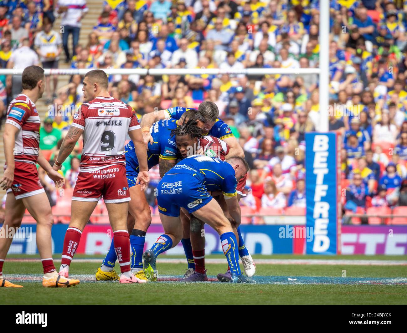 The 2024 Betfred Challenge Cup Final. Ben Currie stops Junior Nsemba ...