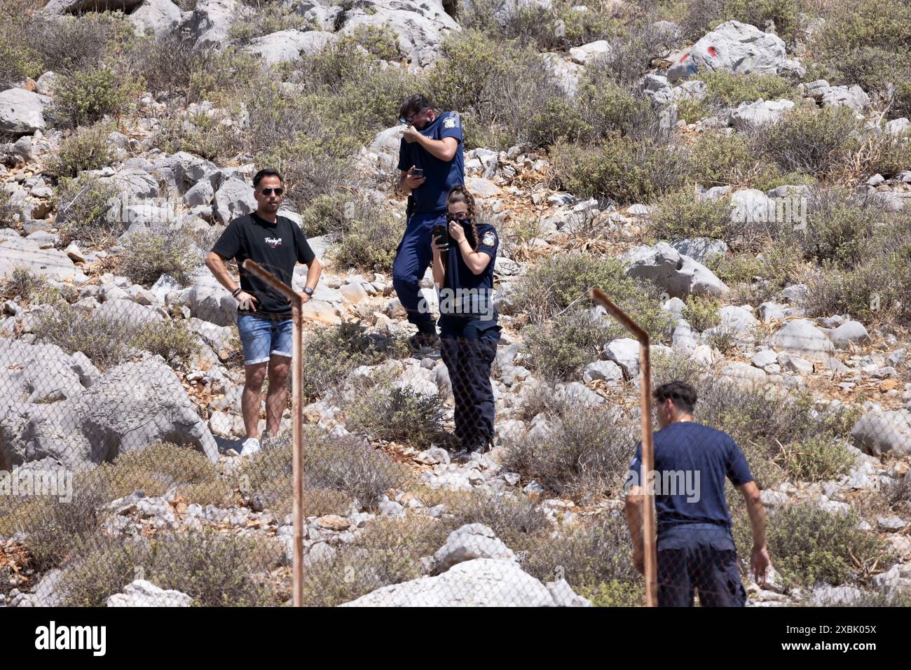 Greek Police Officers guard the body of Michael Mosley at Agia Marina ...