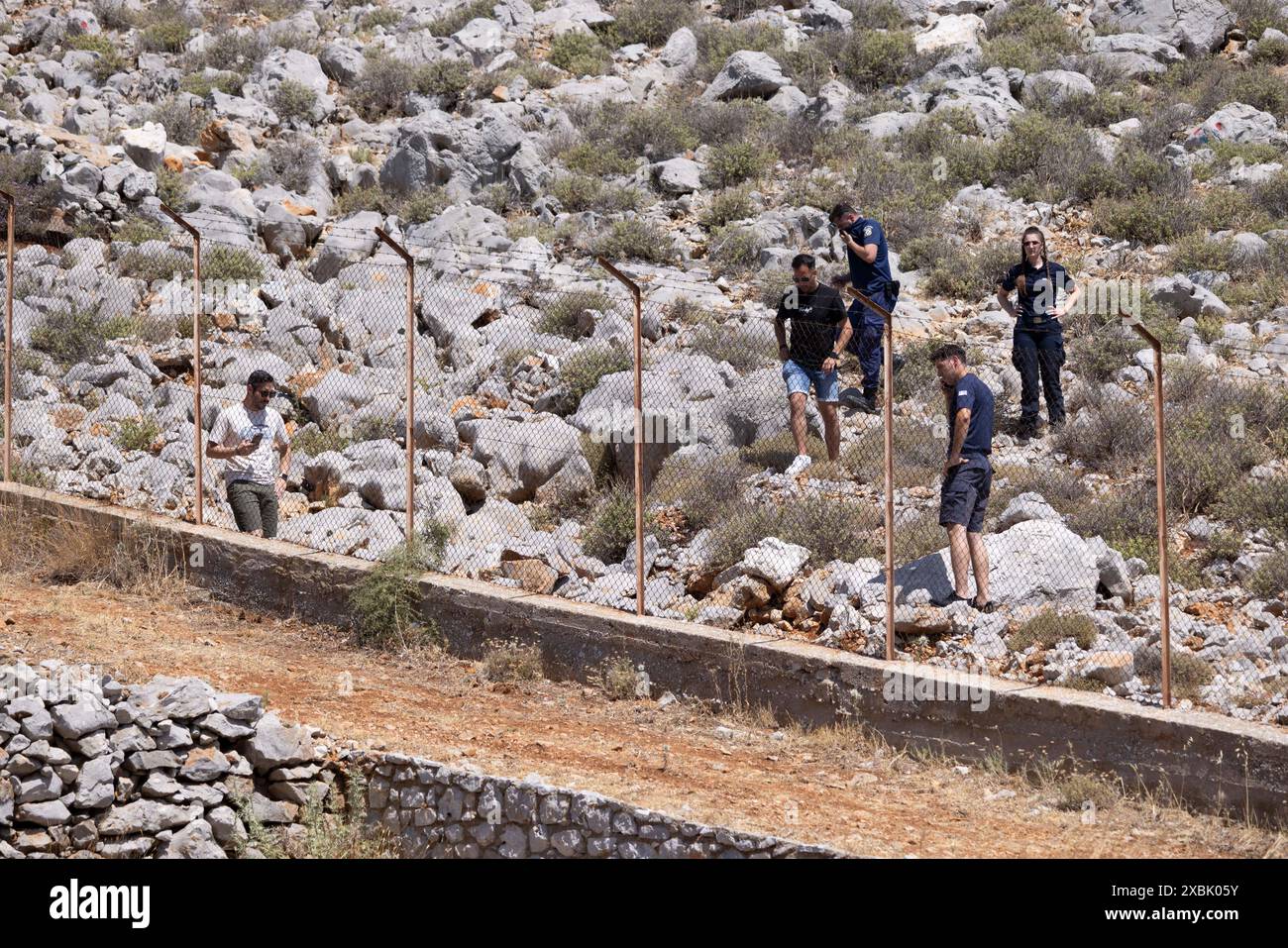 Greek Police Officers guard the body of Michael Mosley at Agia Marina ...
