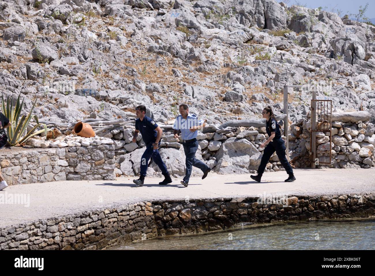 Greek Police Officers guard the body of Michael Mosley at Agia Marina ...