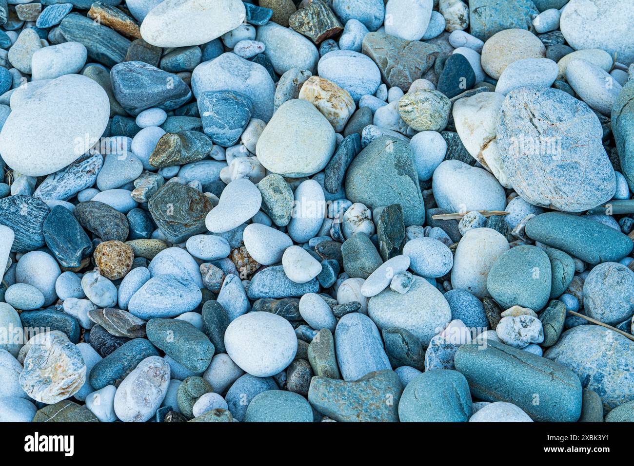 Smooth round grey pebbles, background. Pebble sea beach closeup Stock ...