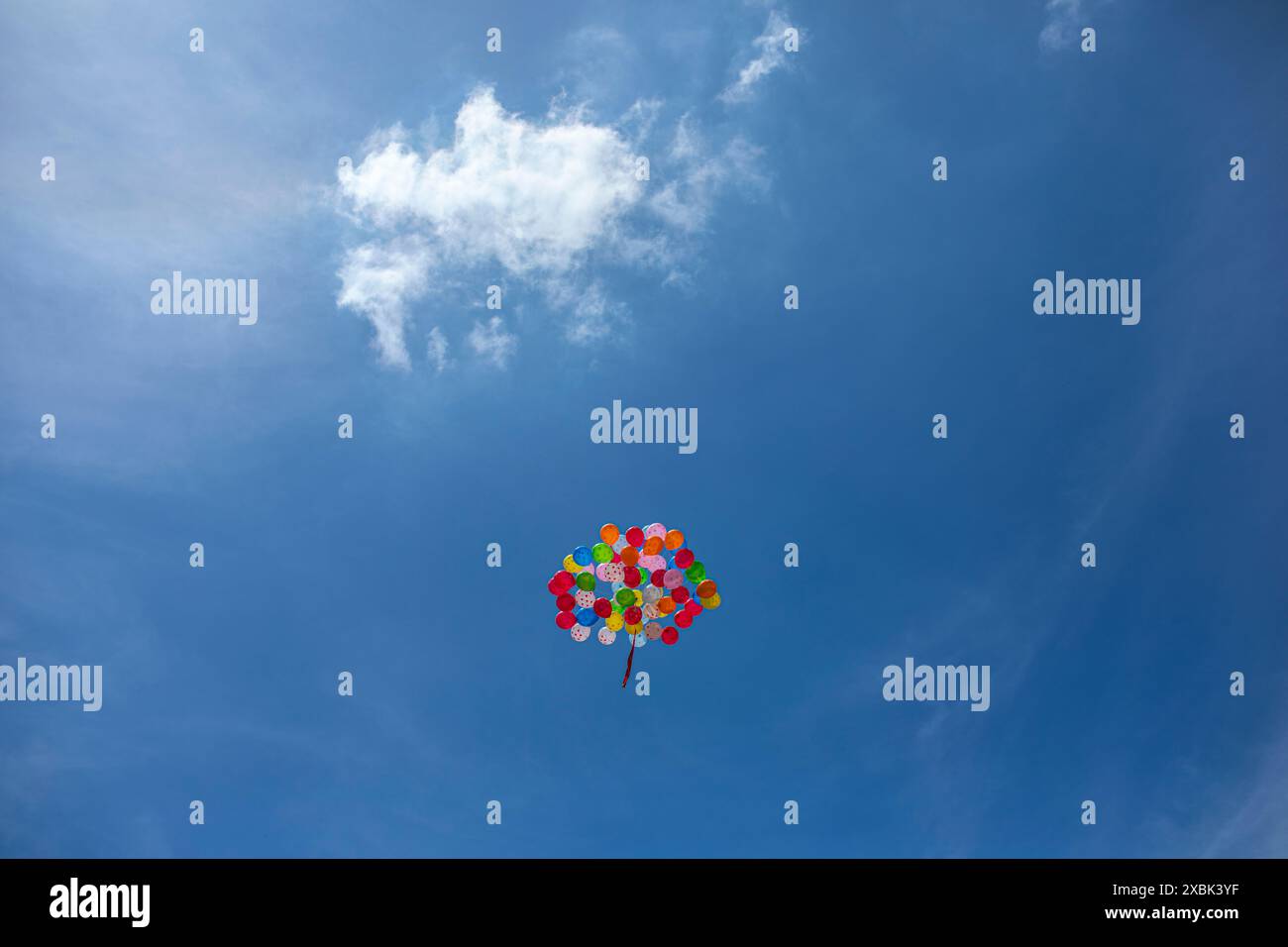 Festive balloons flying in sky hi-res stock photography and images - Alamy