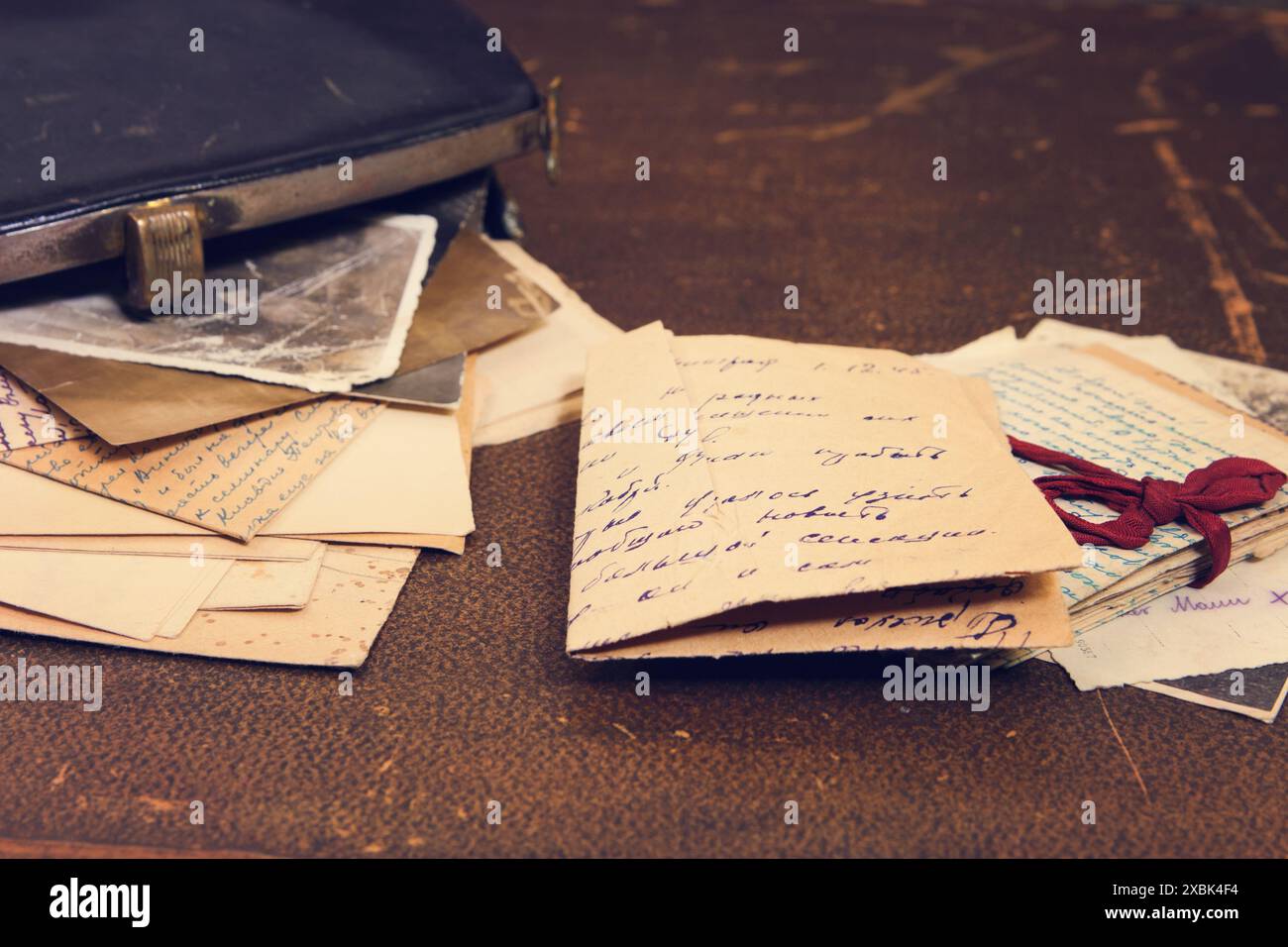 Postal letters in the vintage black handbag Stock Photo - Alamy