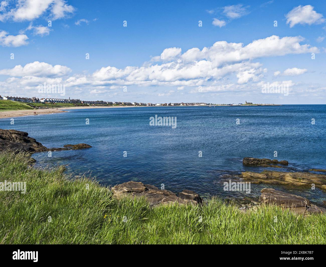 Newbiggin by the Sea beach and bay to Church Point with copy space ...
