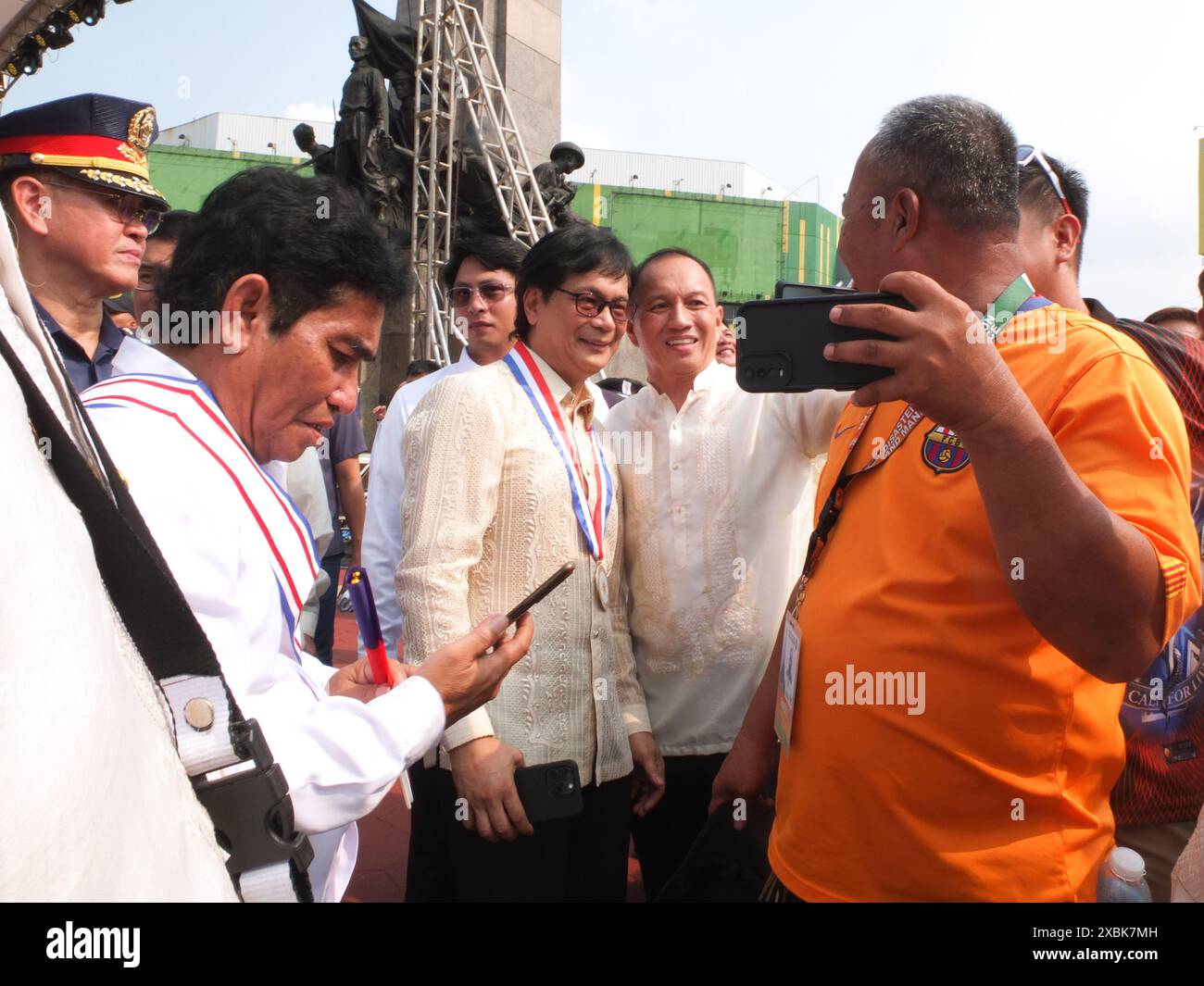 June 11, 2024, Caloocan City, Philippines: DILG Secretary Benhur Abalos readily obliges to ...