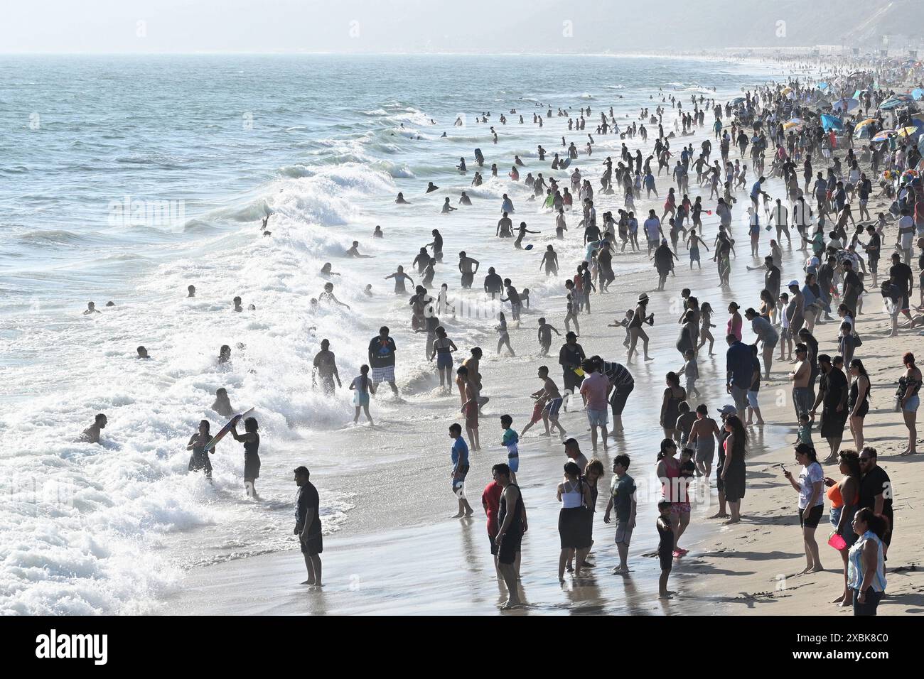 Los Angeles, California, USA - July 29, 2023: Crowd of people rest on ...