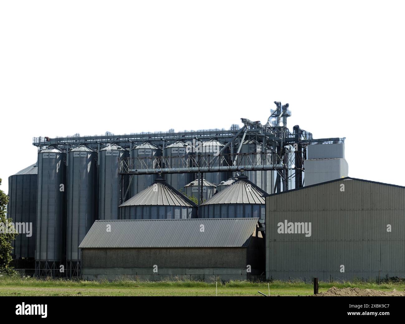 Industrial silos and storage buildings in an agricultural setting under ...