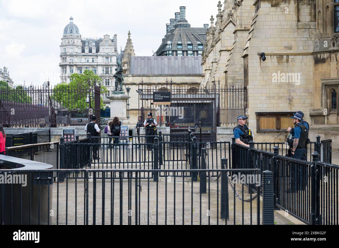 Armed Metropolitan police guard the public visitors entrance to the ...