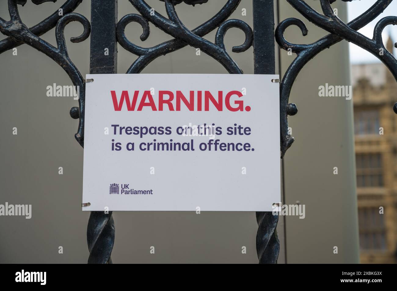 Notice on iron railings warning against trespass at the Palace of ...