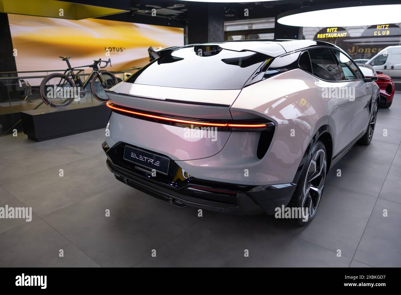 rear view silver battery-Electric Hyper-SUV Lotus Eletre in showroom ...