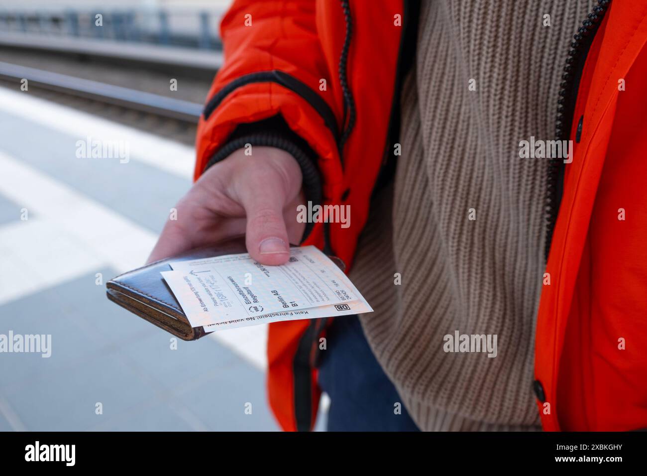 male passenger with Deutsche Bahn ticket, public transportation, travel ...