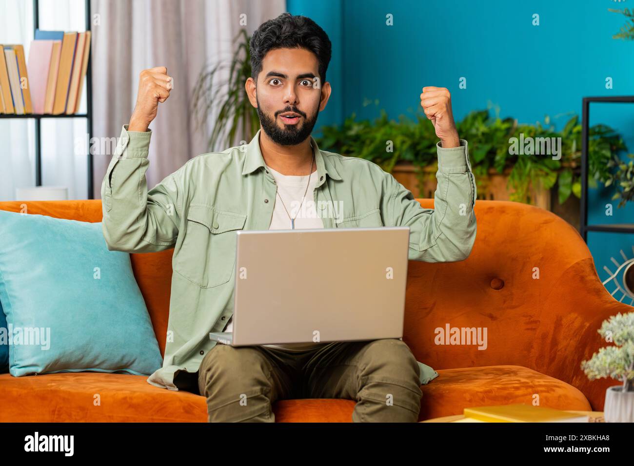 Happy Indian man shouting, celebrating success, winning, goal ...