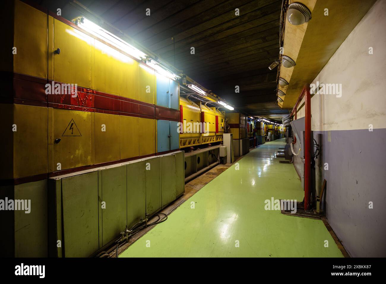 Experimental equipment of hadron collider in long corridor. Old ...