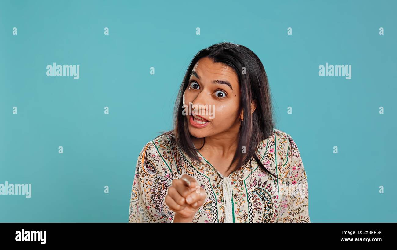 Upset indian person fighting with friend, doing scolding gesturing ...