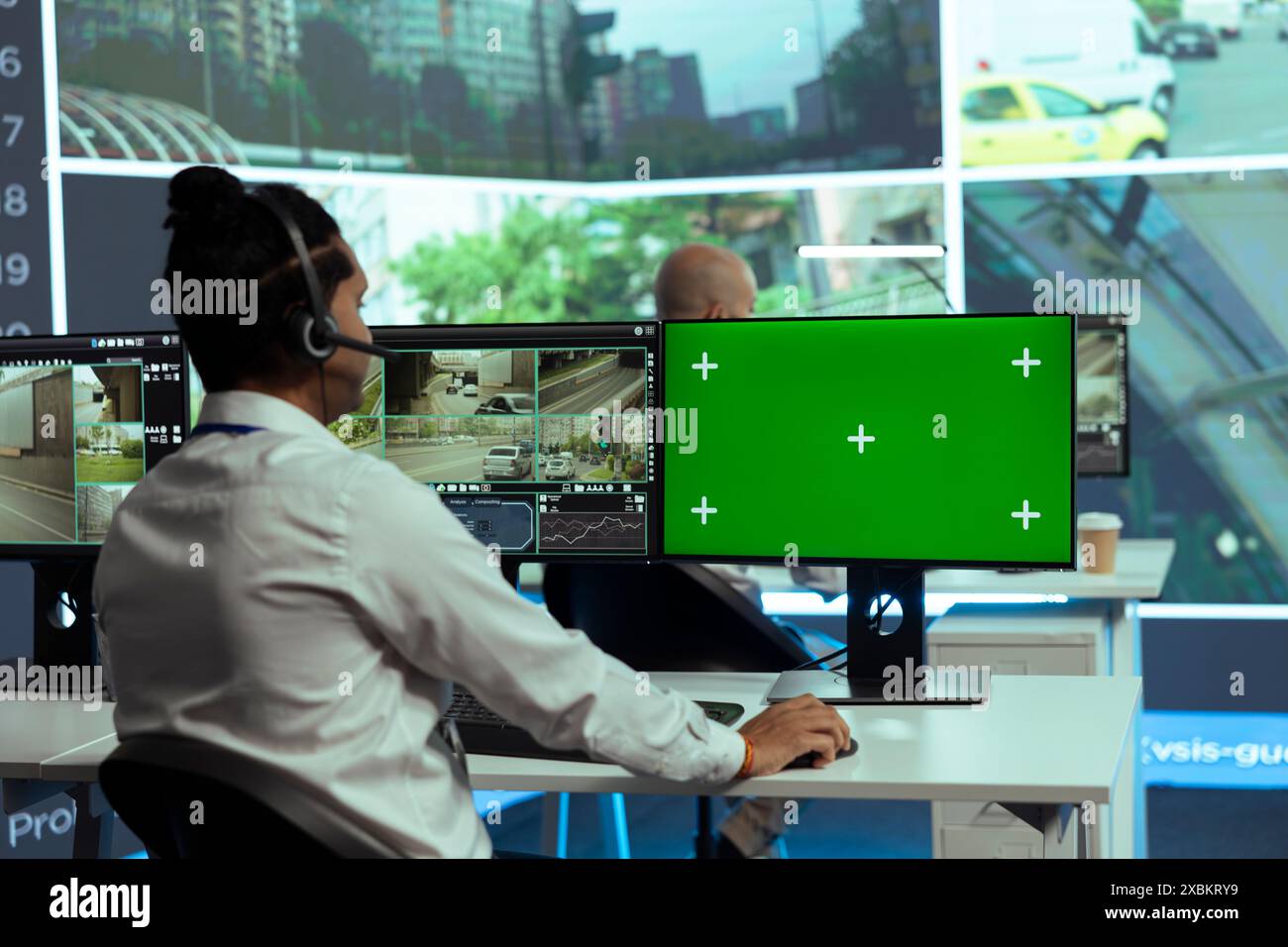 Indian employee gather intelligence on urban traffic activity next to ...