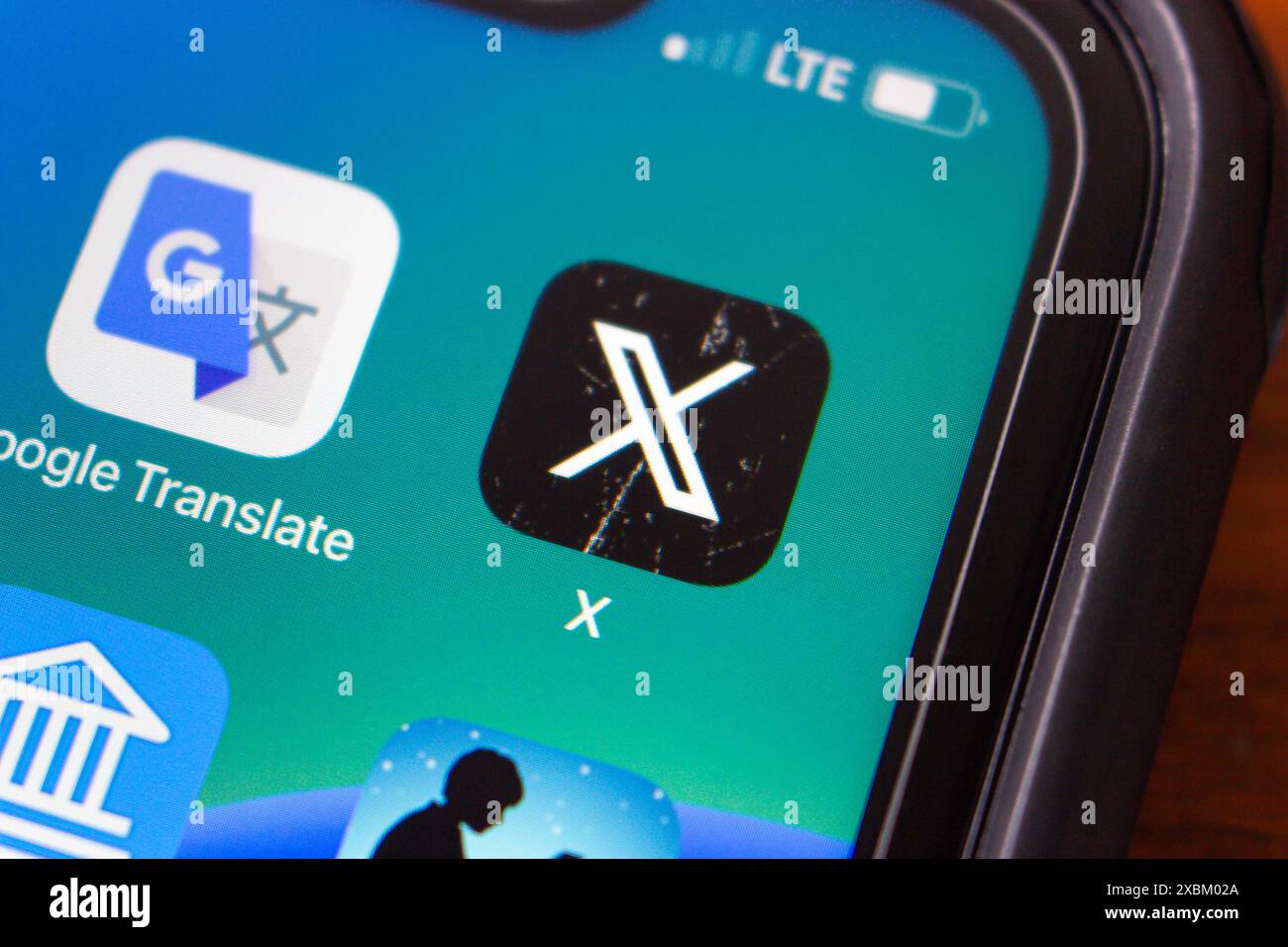 Image of X app on iPhone home screen. X is an American technology ...