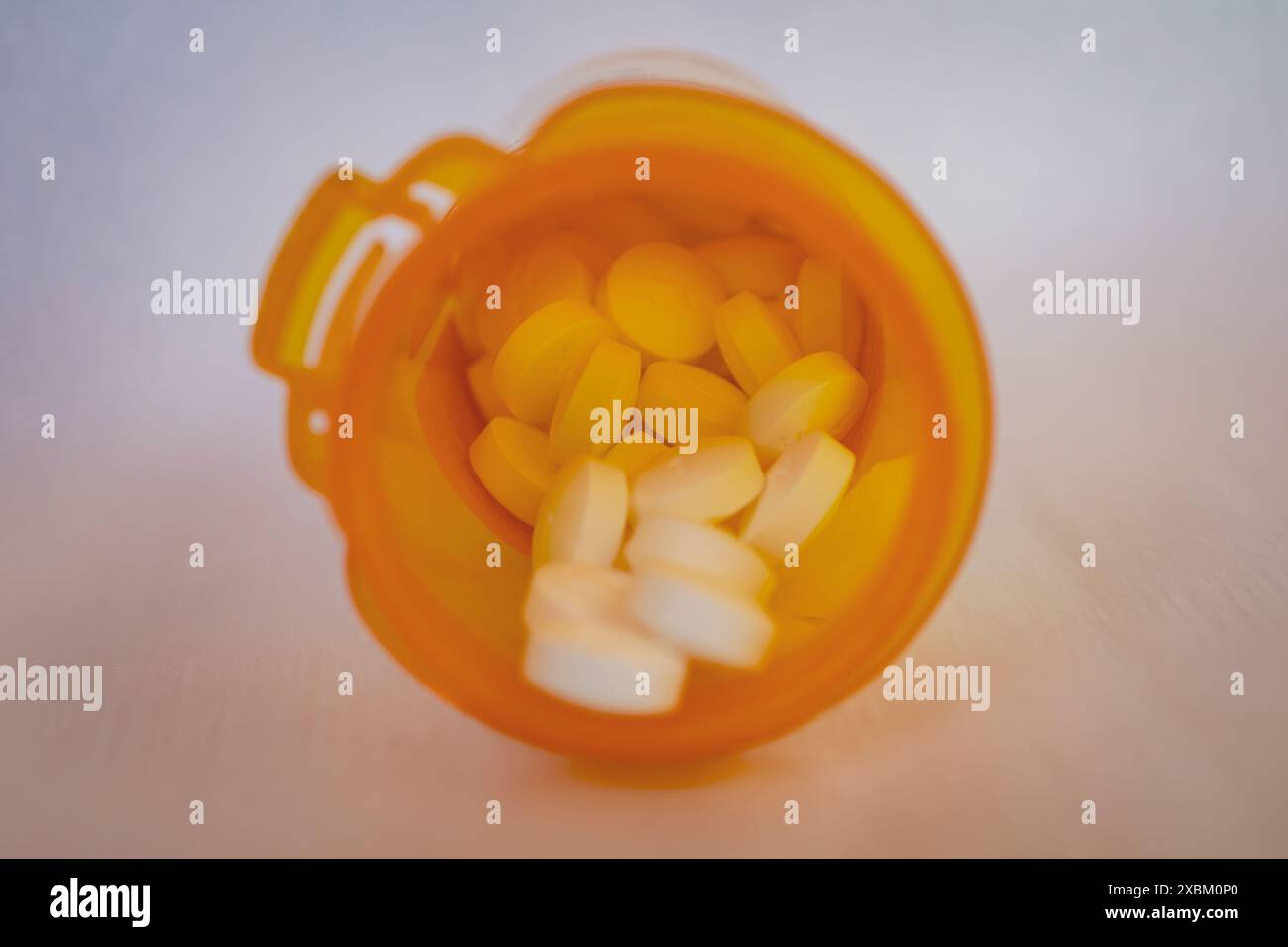 Generic metformin dispensed from a pharmacy 500 mg tablets on a white ...