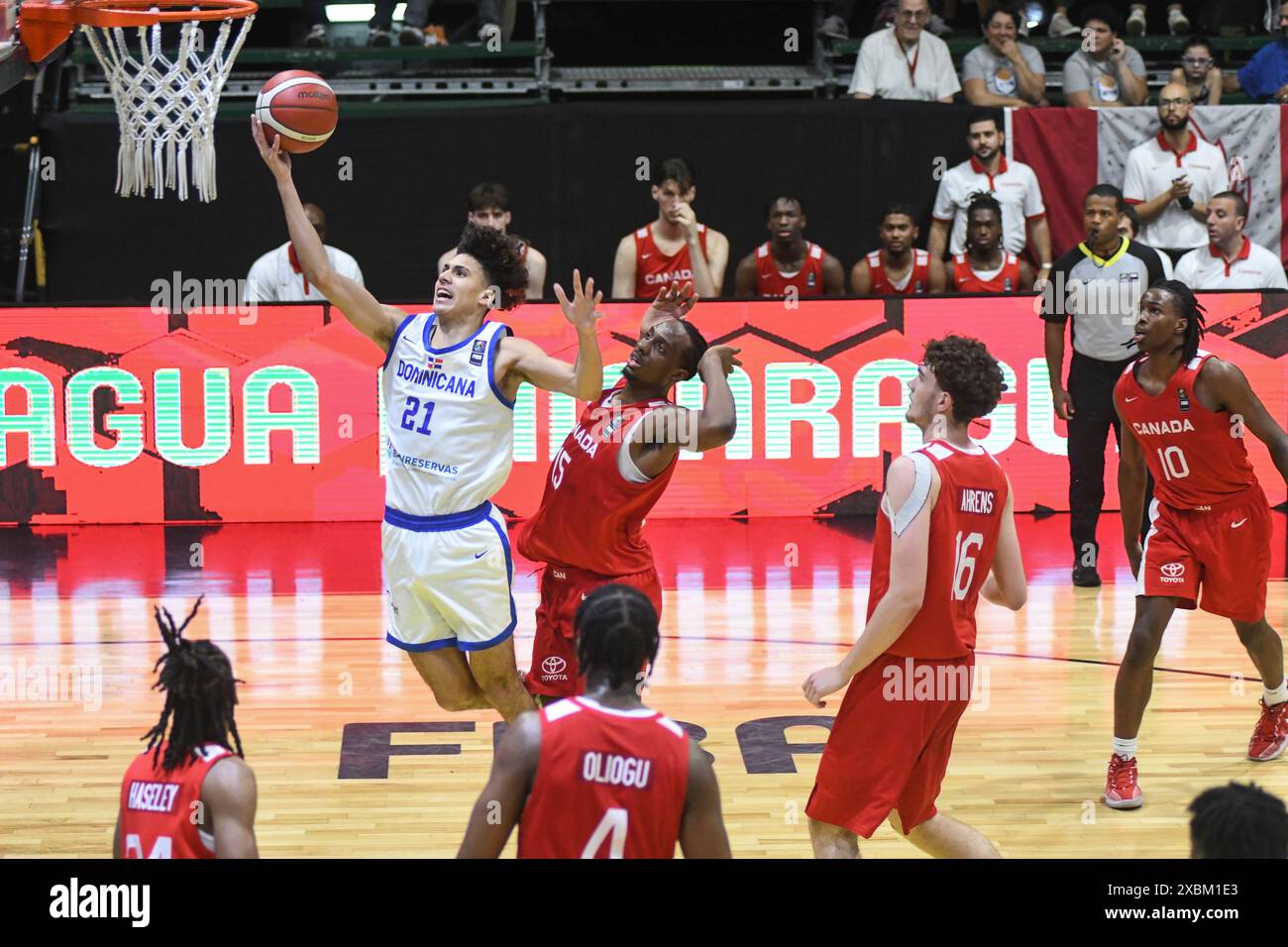Fernando De Los Santos (Dominican Republic) against Canada. FIBA ...