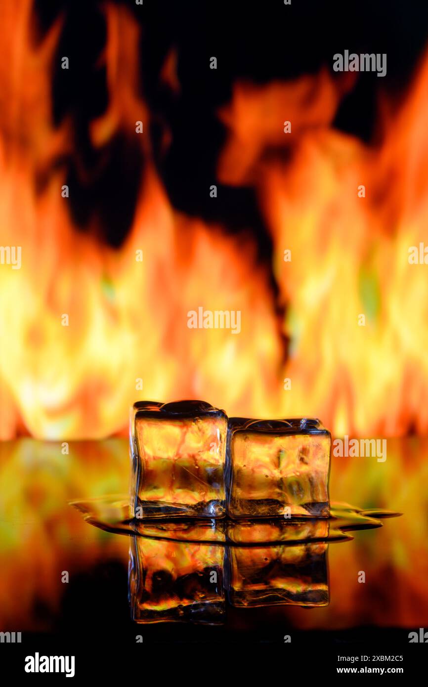 ice cubes on fire background for alcoholic cocktail 5 Stock Photo - Alamy