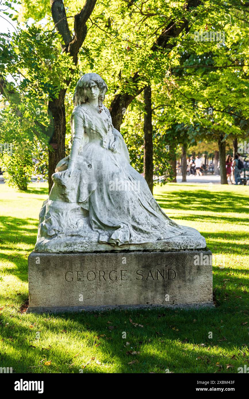 Marble statue of French writer George Sand inside Jardin du Luxembourg ...
