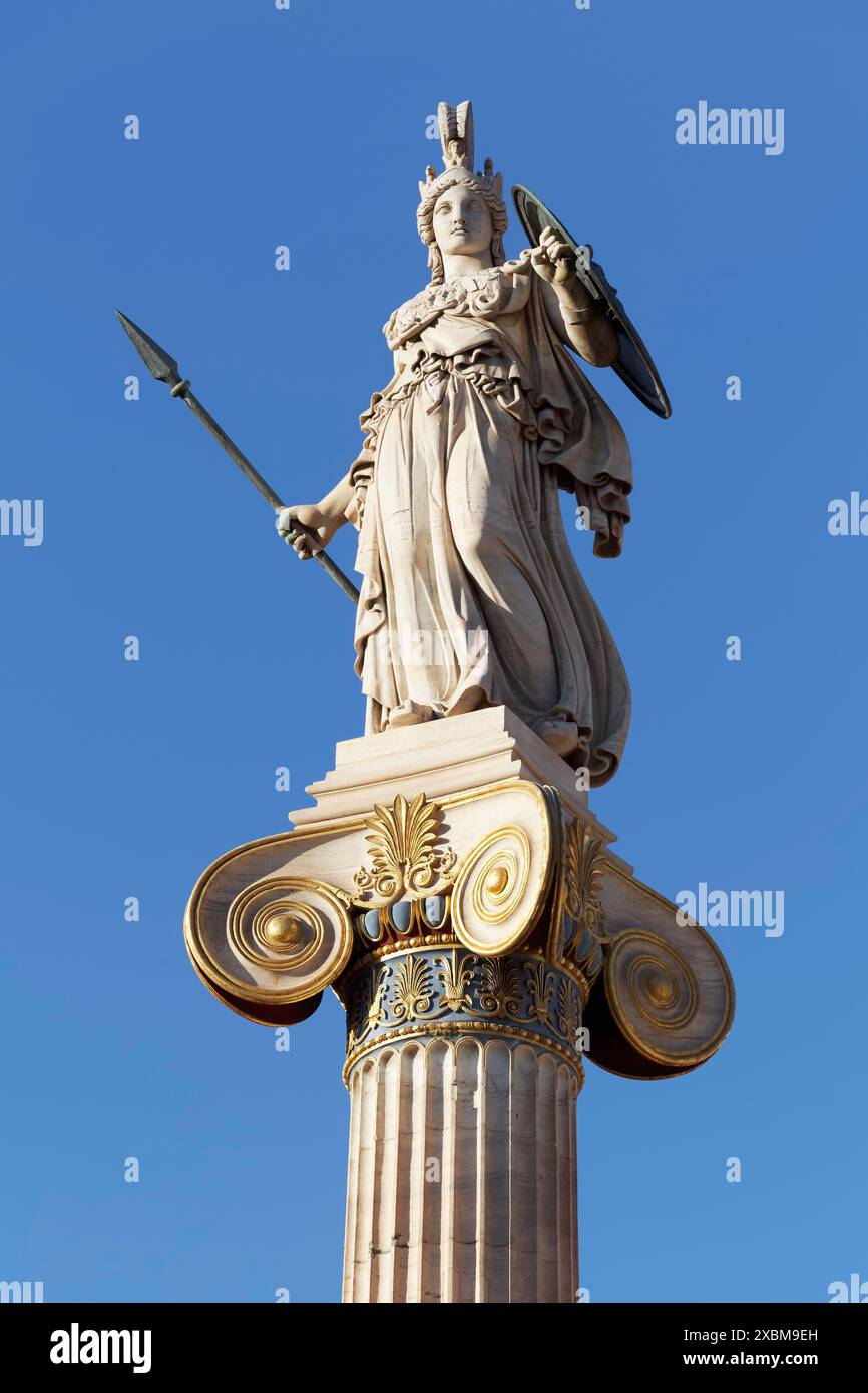 Column with statue of Athena in front of the Academy of Athens, blue ...