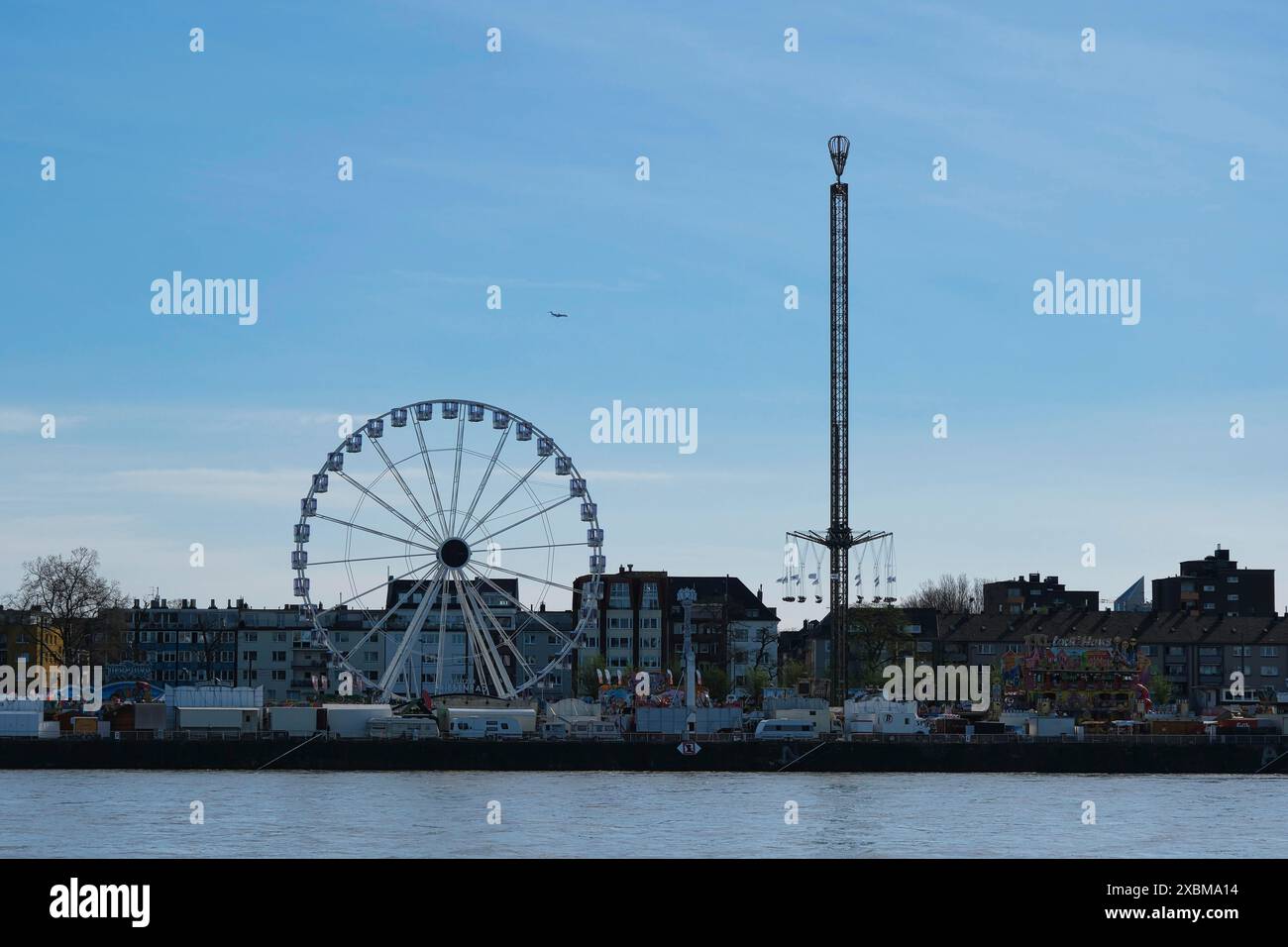 View over the Rhine with funfair and Ferris wheel, Cologne, Germany ...