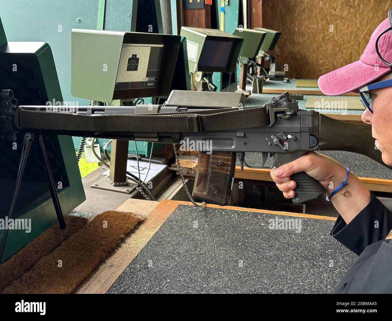 Woman Training Precision Shooting with a Military Assault Rifle in ...