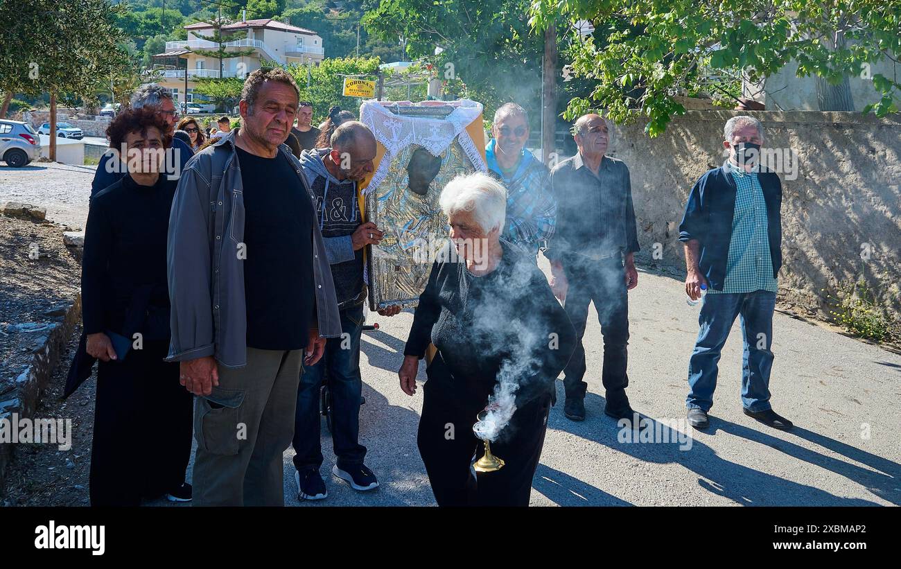 People take part in a procession in a village community, procession of ...