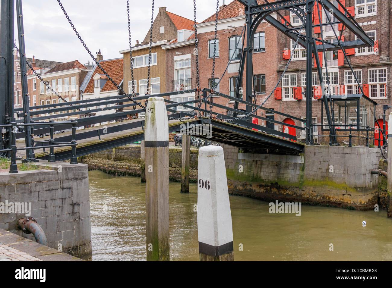 Historic bridge over a canal, surrounded by old brick buildings in the ...