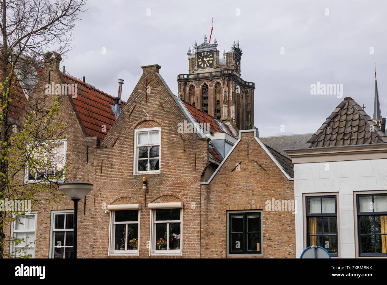 Historic buildings with red roofs and a church tower in an urban ...