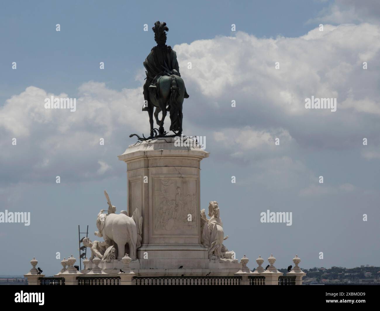 An impressive marble equestrian statue stands on a decorative pedestal ...