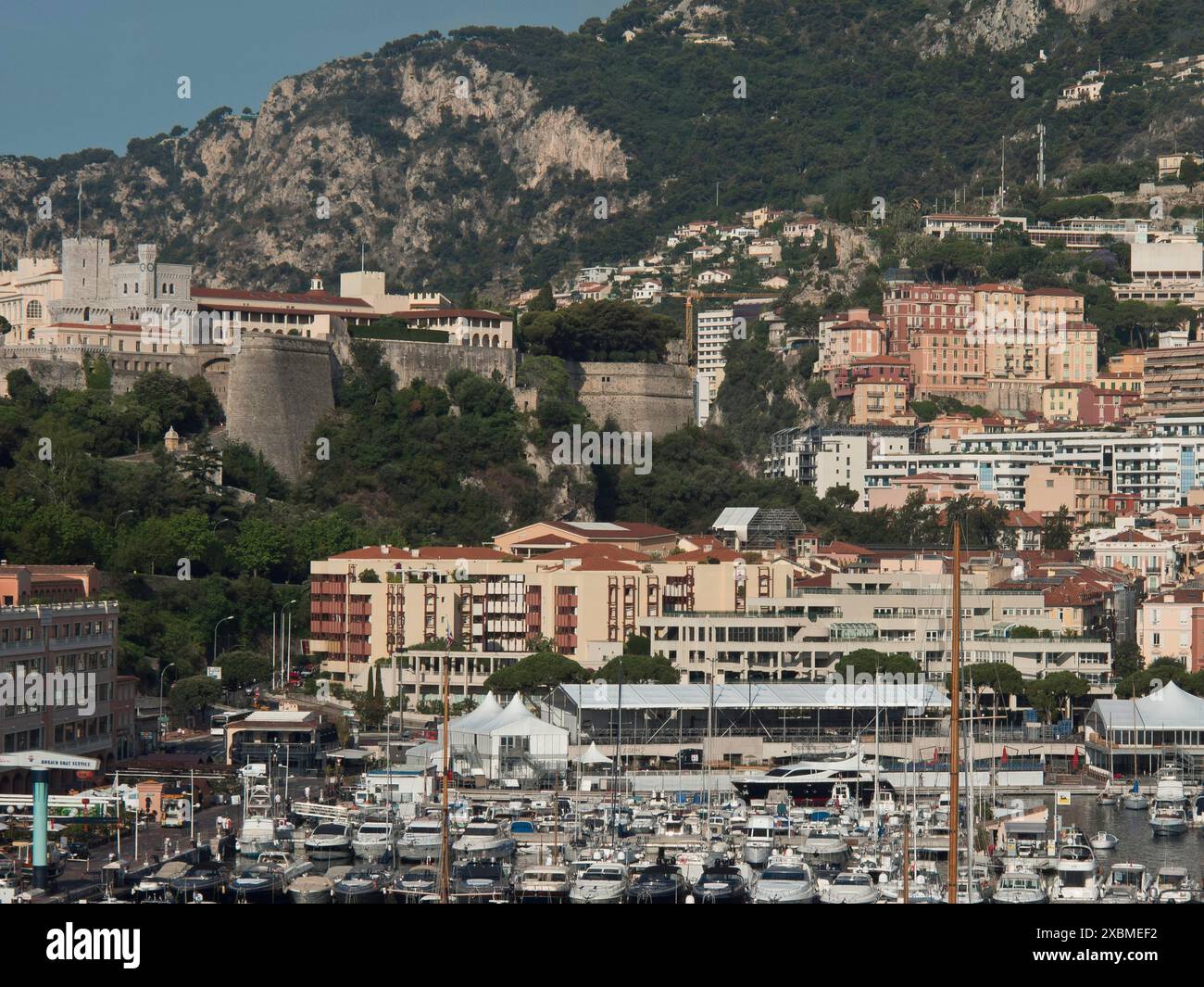 City view with medieval fortress on a hill surrounded by modern ...