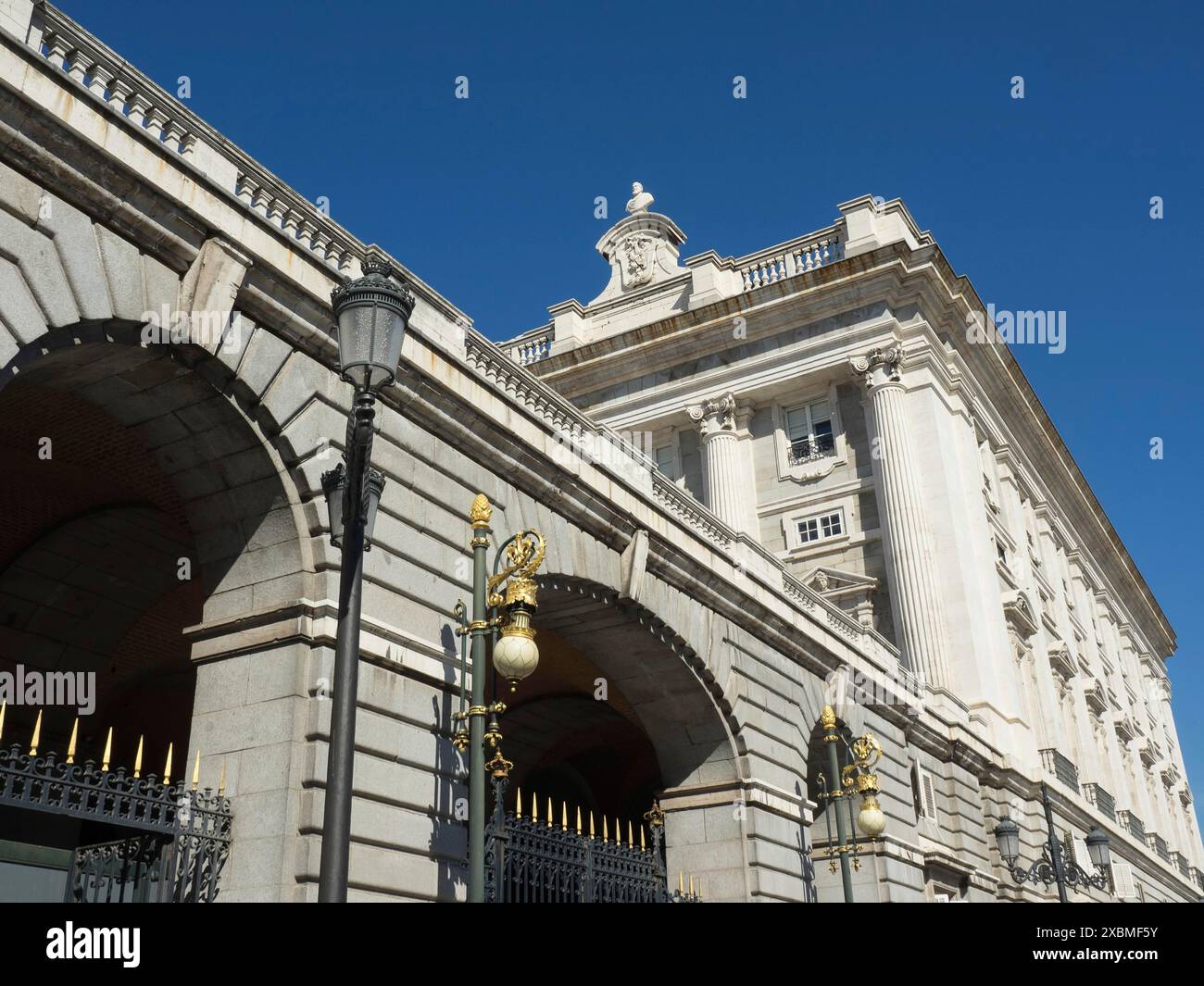 Large, historic building with white columns and golden decorations ...