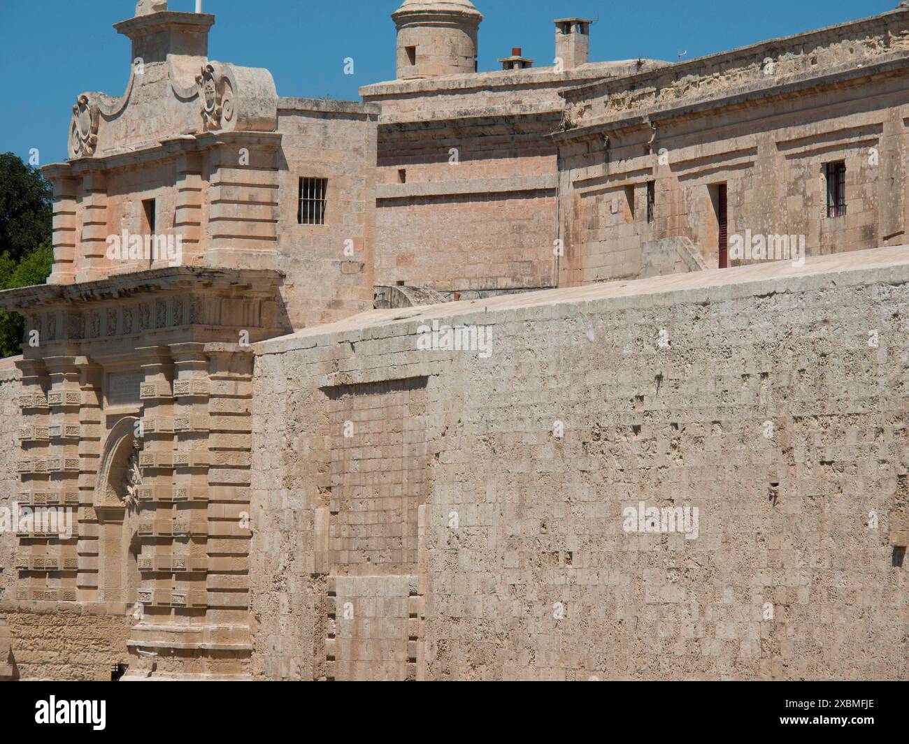 Section of a historic fortress with detailed stone architecture, mdina ...