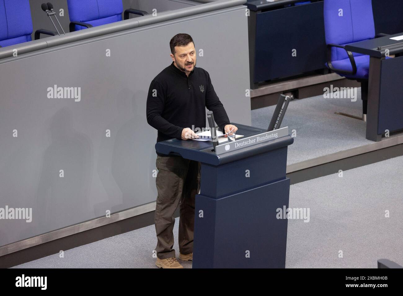Volodymyr Zelensky (President of Ukraine) delivers a speech at a ...