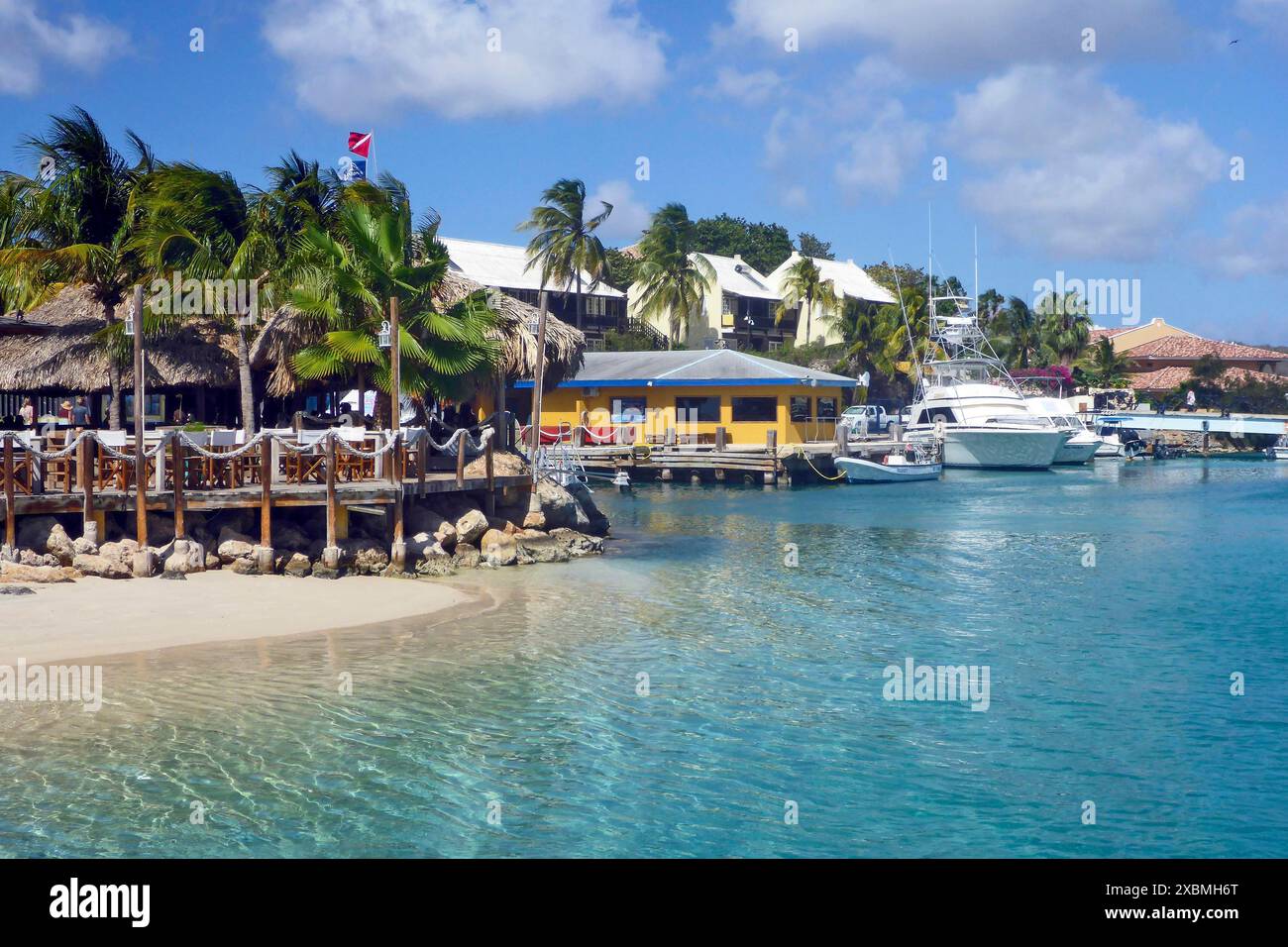 View over shallow narrow inlet channel through lagoon in front of ...