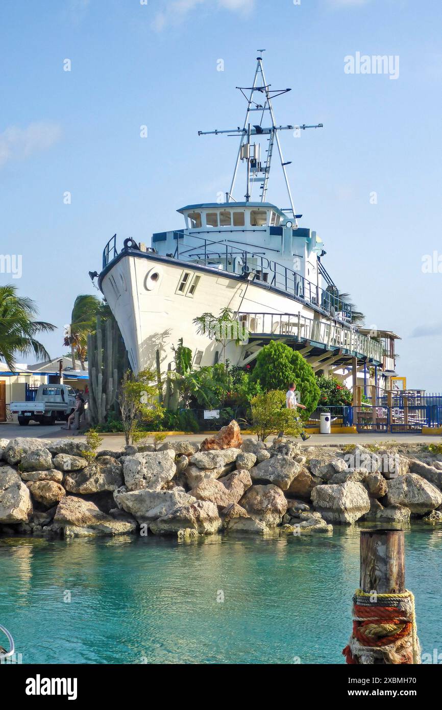On small island accessible via short bridge installed on dry land at ...
