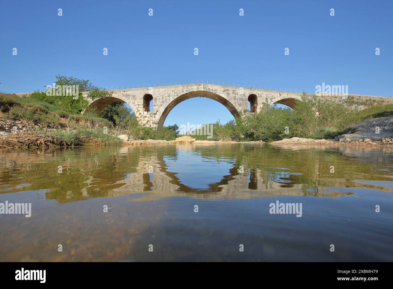 Roman stone arch bridge Pont Julien built 3rd century over the river ...