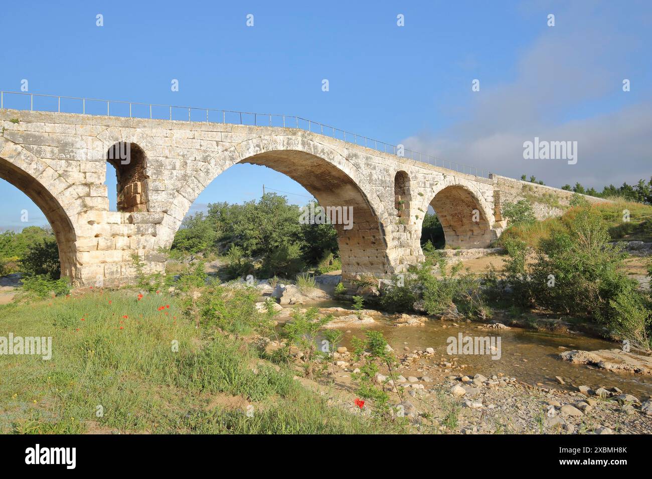 Roman stone arch bridge Pont Julien built 3rd century over the river ...