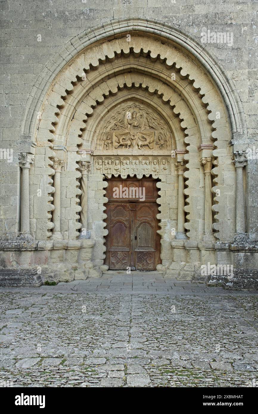 Portal with tympanum of Prieure Notre-Dame built 12th century, priory ...