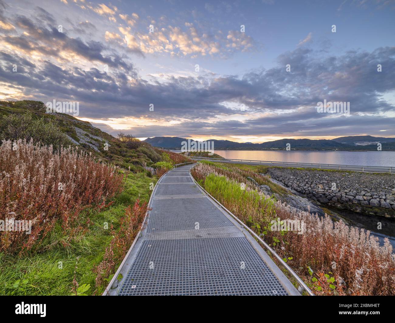 Circular route along the Atlantic Road, blue sky with clouds, sunrise ...
