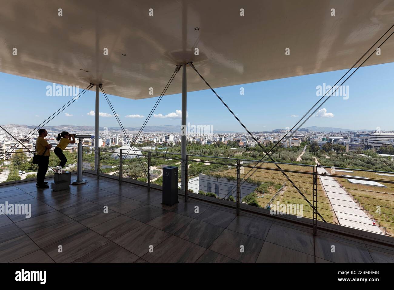 Visitors on the viewing terrace, view of the landscape park and Athens ...