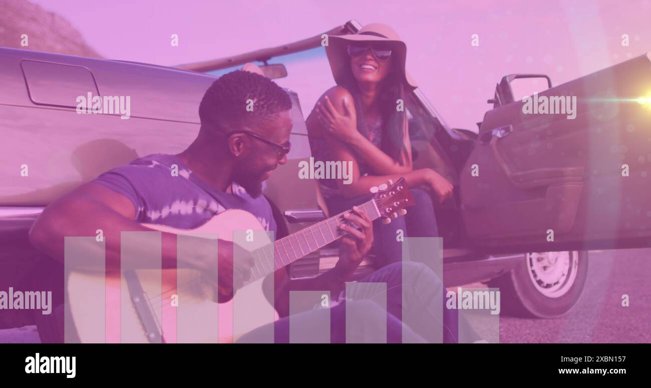 Image of audio eq meter over happy diverse couple sitting by car on ...