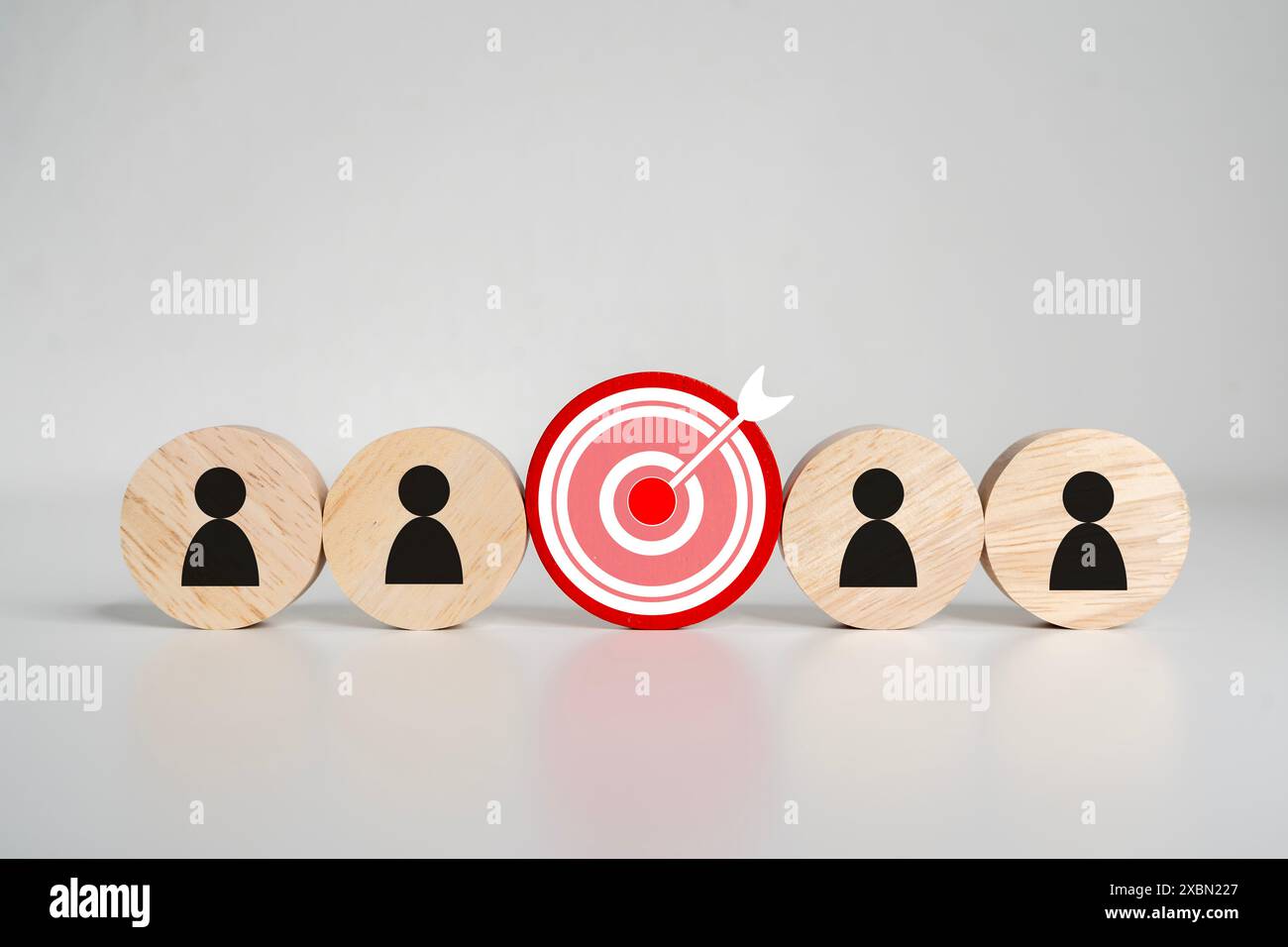 Customer relationship management concept. wooden block with target icon ...