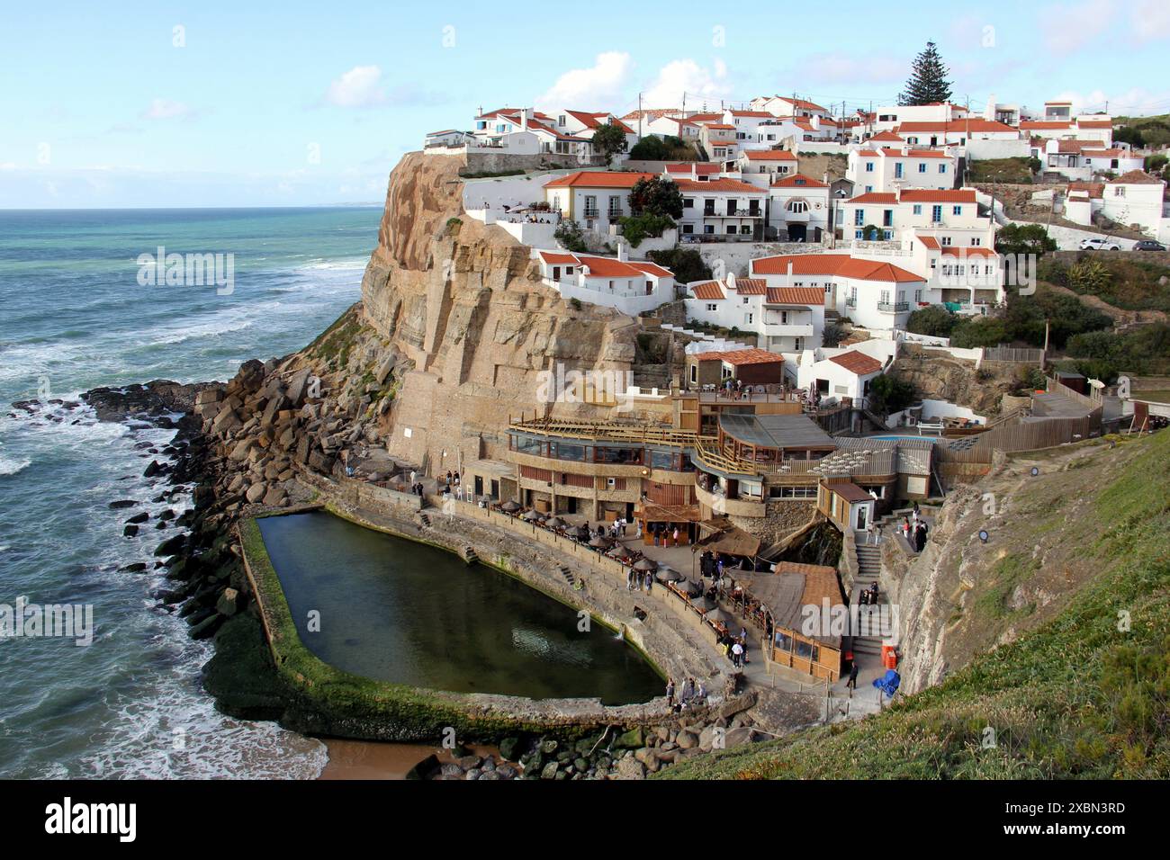 Costal cliffs and oceanic water pool at Praia das Azenhas do Mar ...