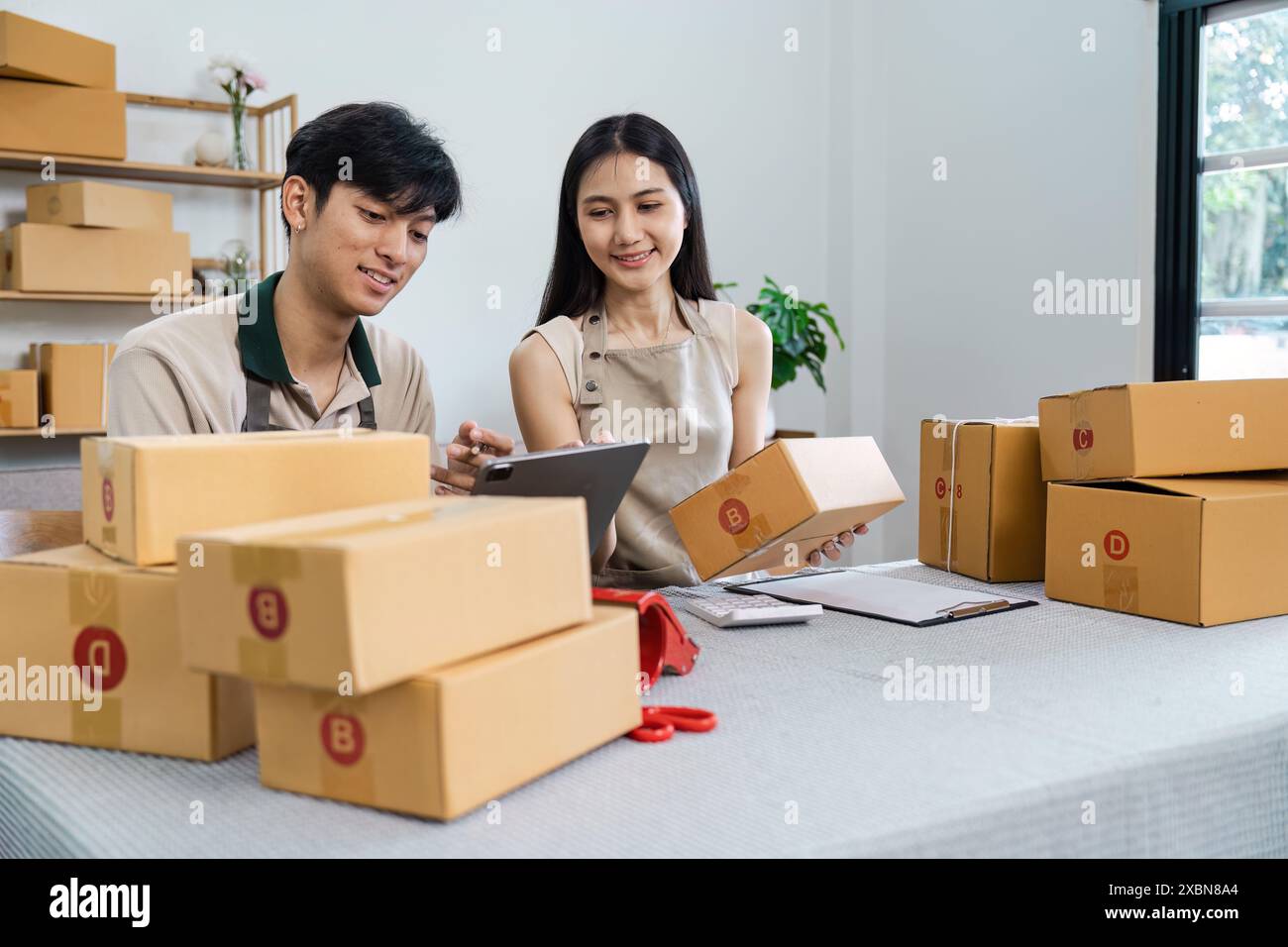 Young Entrepreneurs Managing E-Business Operations with Digital Devices ... Young Entrepreneurs Managing E-Business Operations with Digital Devices ...