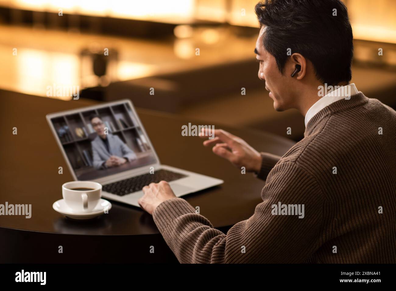 Talking over video conference hi-res stock photography and images - Alamy